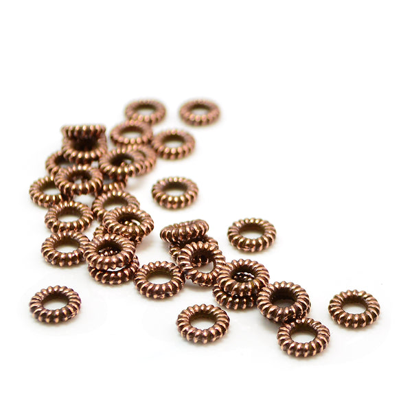 Coiled Spacers- Antique Copper (20 pieces) - Beadshop.com